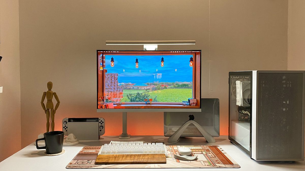Small White and Brown Desk Setup of a Designer
