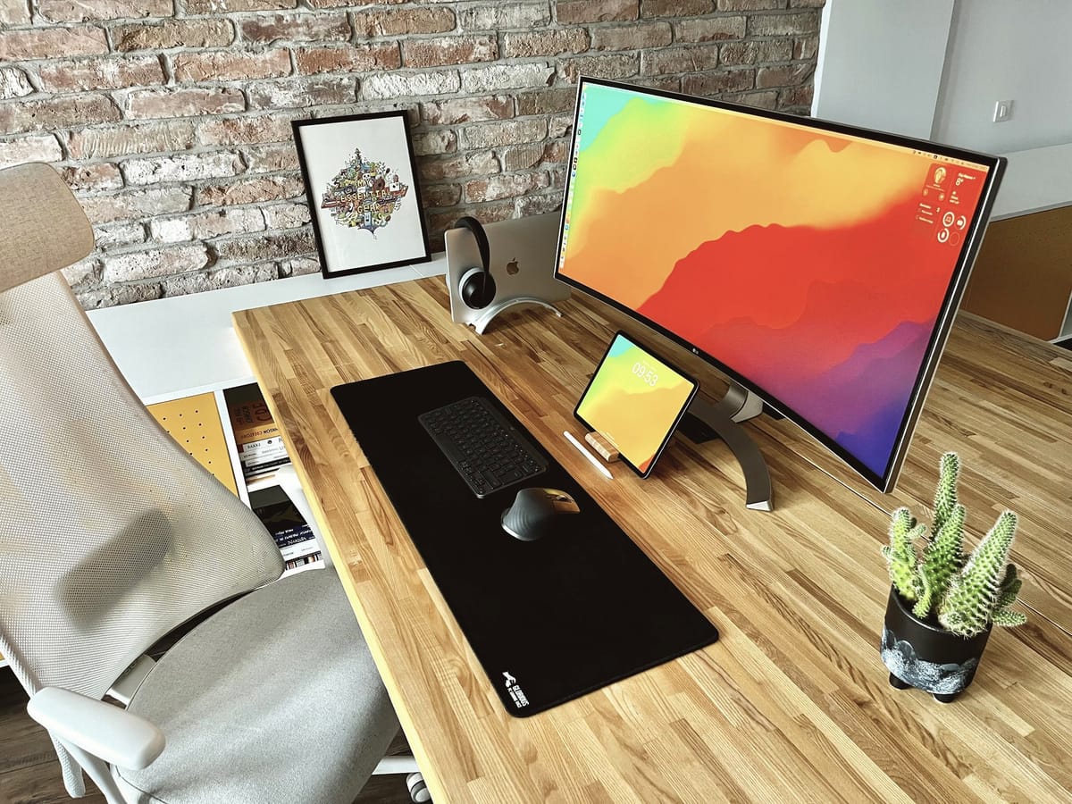 Desk Setup With Exposed Brick Wall