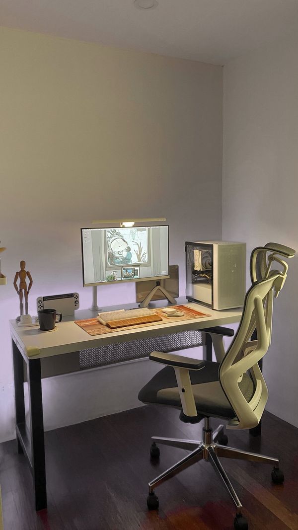Small White and Brown Desk Setup of a Designer