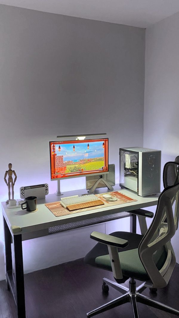 Small White and Brown Desk Setup of a Designer